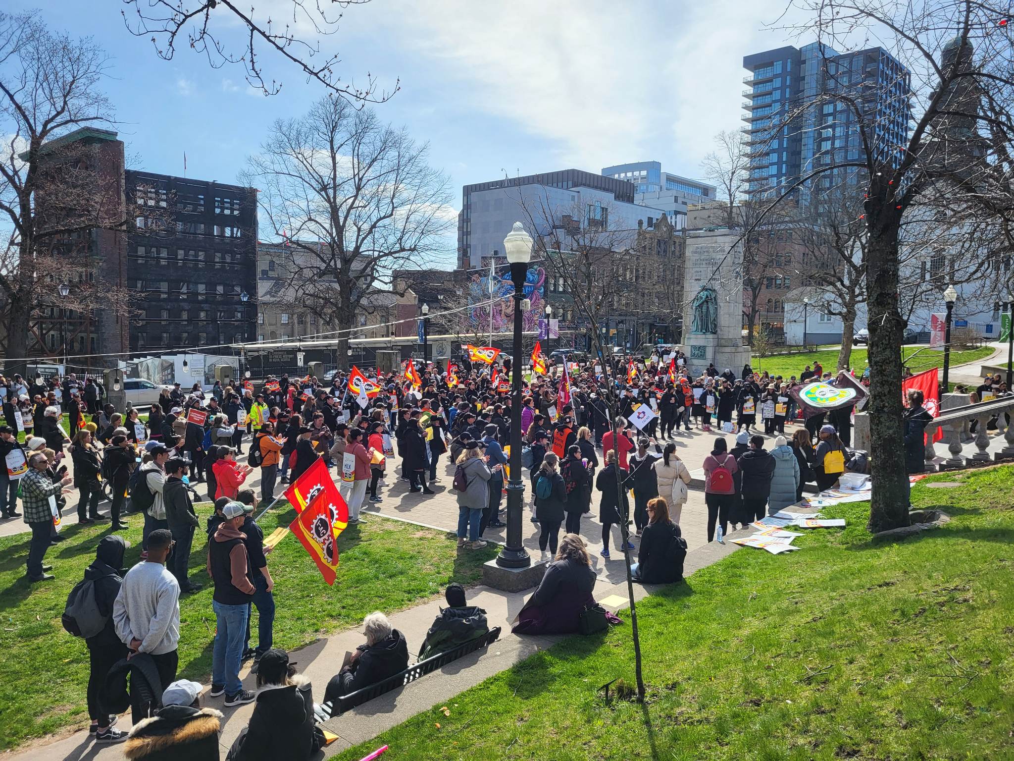 Striking federal workers rally at Grand Parade