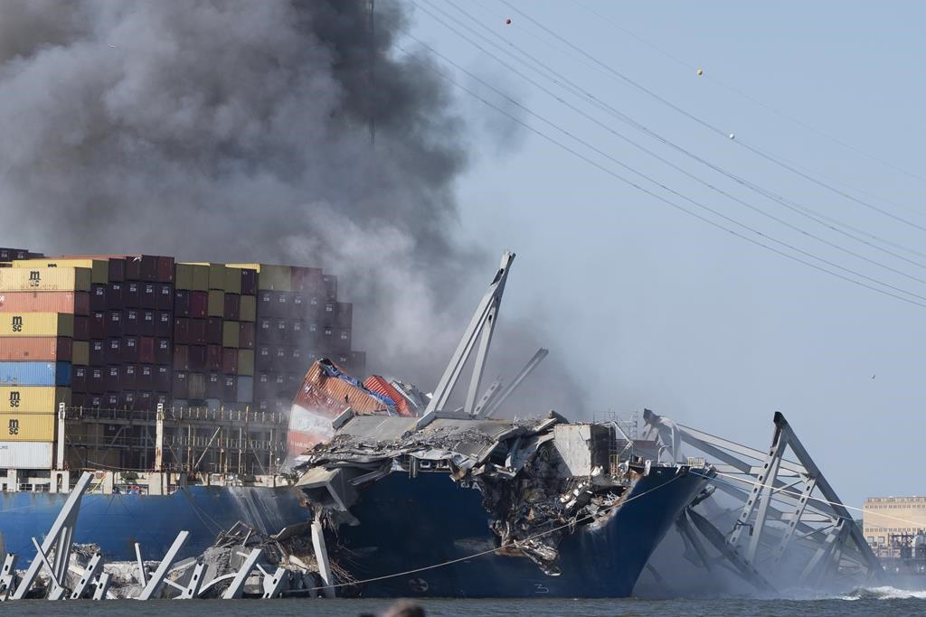 As work continues to remove cargo ship from collapsed Baltimore bridge ...