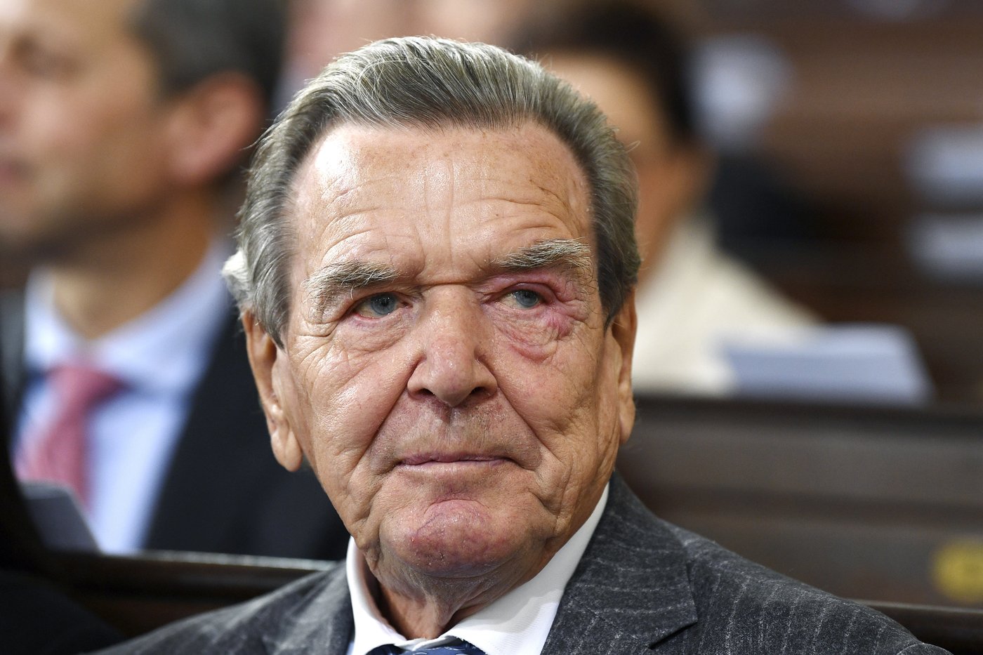 Former German leader Gerhard Schröder receives treatment after showing ...