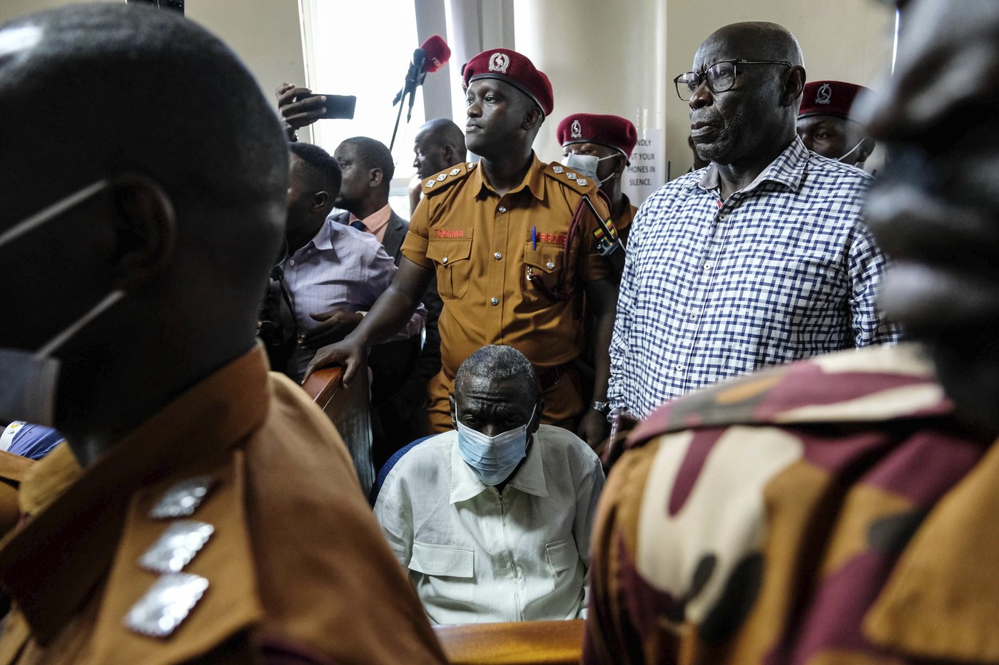Ugandan opposition figure Kizza Besigye is charged with treason, which ...