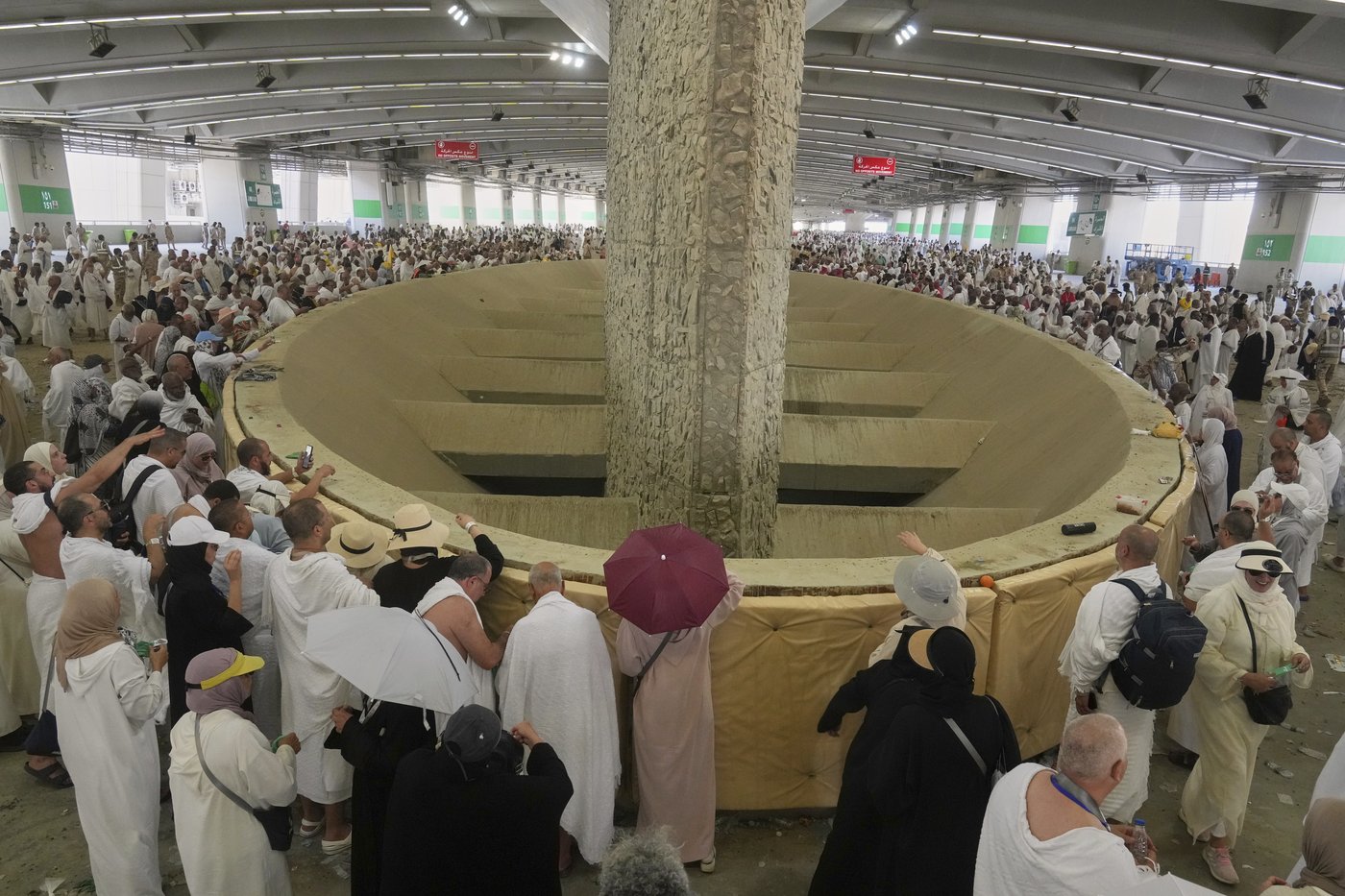 Symbolism and smiles during the stoning of the devil ritual at the Hajj