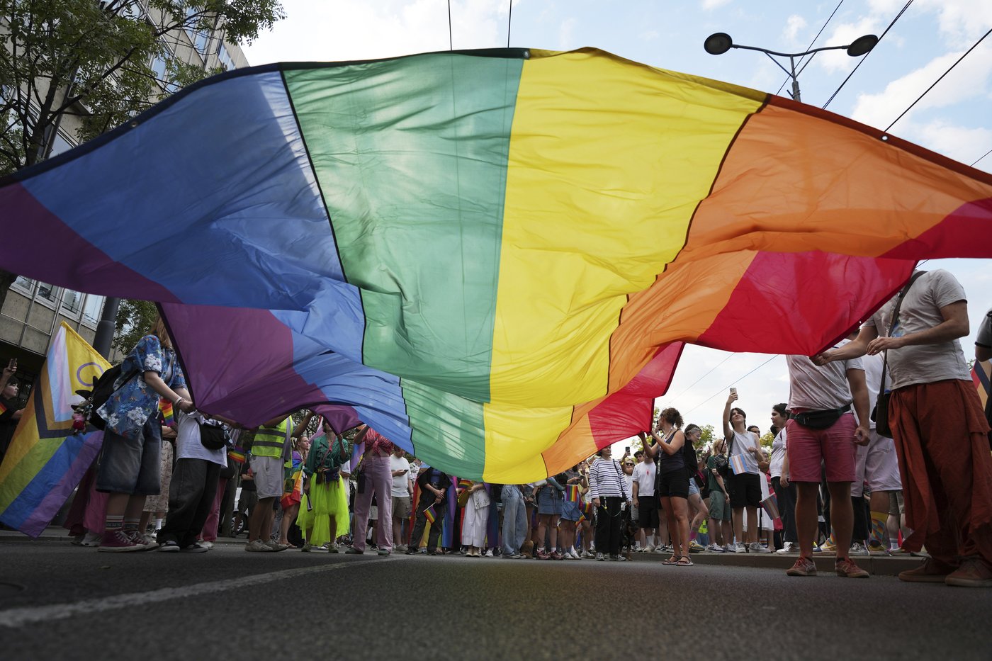 Pride march in Serbia condemns police violence at anti-government ...